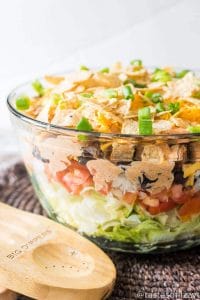 Mexican Salad {An Easy Layered Recipe with Beef, Beans and a Special Sauce}